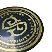 China Custom Black & Gold Embossed Aluminum Wine Label With Adhesive Backing for sale