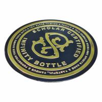China Custom Black & Gold Embossed Aluminum Wine Label With Adhesive Backing for sale