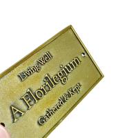 China Custom Vintage Embossed Zinc Alloy Sign With Two Mounting Holes for sale