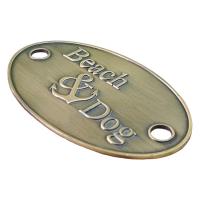 China Custom Vintage Embossed Oval Zinc Alloy Metal Nameplate for sale