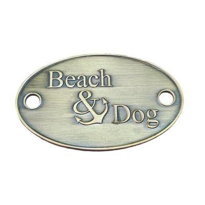 China Custom Vintage Embossed Oval Zinc Alloy Metal Nameplate for sale