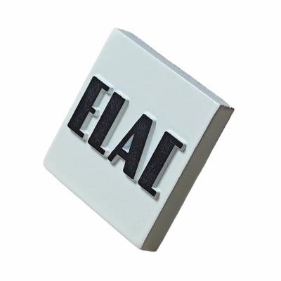 China Customized White Spray-painted Three-dimensional Aluminum Nameplate Subtle Black Logo Metal Plaque Nameplate. for sale