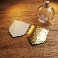 China Custom Shield‑Shaped Painted‑Fill Gold Aluminum Perfume Nameplate for sale