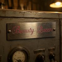 China Custom Etched Stainless Steel Nameplate Filled With Pink Paint With Mounting Holes for sale