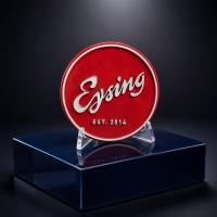 China Custom Zinc Alloy Embossed White Nameplate Circle Red Background Label with Adhesive for sale