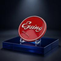 China Custom Zinc Alloy Embossed White Nameplate Circle Red Background Label with Adhesive for sale