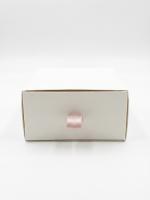 China Pure white matte cardboard drawer box with pink ribbon handles. Simple folding gift box customization. for sale