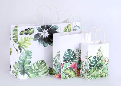 China Tropical Leaf Printed Paper Shopping Bags with Twisted Handles for sale