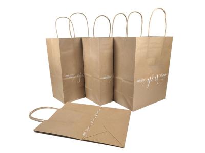 China Kraft-Look Paper Gift Bag with White Script and Leaf Motifs for sale