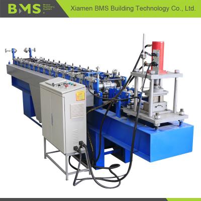 China Professional Steel Roller Shutter Door Roll Forming Machine 0.6-1.0mm Thickness for sale