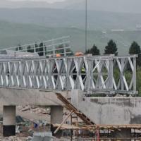 China ISO9001 Hot-Dip Galvanized Temporary Steel Truss Bridge with 6750 kN.m Moment Capacity and 843.9 kN Shear Strength for sale