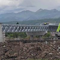 China Fabricated Portable Steel Truss Bridge - Lightweight Design with 843.9 kN Shear Capacity and 8228.6 kN.m Moment Rating for sale