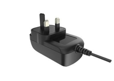 China 24W UK Plug Black 2A 12 Volt AC Switching Power Supply Universal AC DC Wall Mount for sale