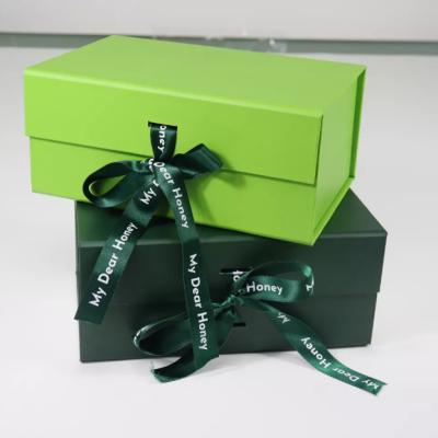 China Luxury Foldable Rigid Gift Boxes Cardboard Packaging With Ribbon for sale