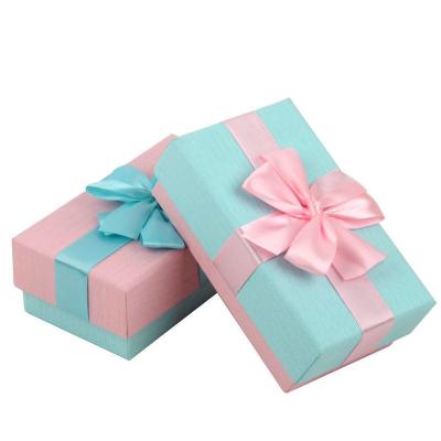 China Recycled Gray Cardboard Art Paper Gift Packing Box with Ribbon Hot Stamping Custom Size 350g for sale