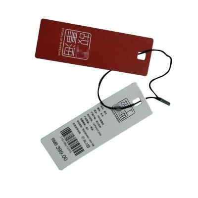 China Custom Offset Printing White Cardboard Hang Tags with Embossing and Glossy Lamination - 800-1800gsm Cardboard Options for sale