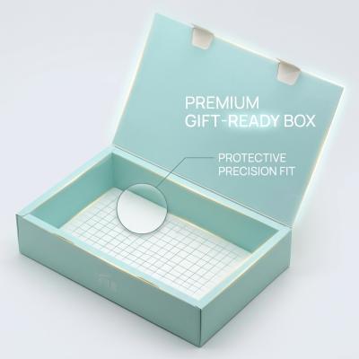 China Luxury Gold Foil Stamped Rigid Cardboard Cosmetic Gift Packaging Box With Magnetic Lid for sale