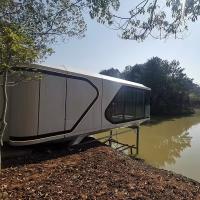 China Custom Prefabricated Space Capsule Home with Steel Structure Frame - Custom Sizes Available for Outdoor Installation for sale