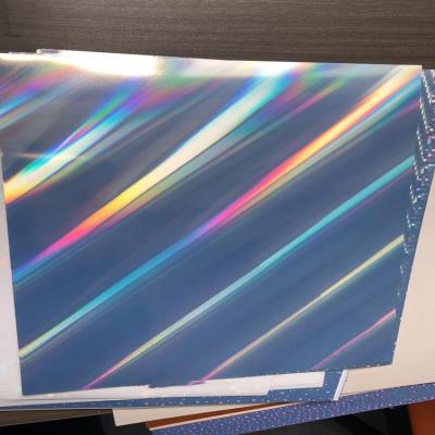 China Inkjet Printable Waterproof Holographic Hologram Sticker Paper 215mm x 762mm Self Adhesive Industrial for sale