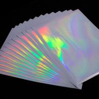 China Rainbow Holographic Sticker Cold Lamination Film A4 Waterproof Vinyl for DIY Crafts Photo Decoration for sale