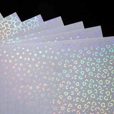 China Holographic Love Heart Transparent Vinyl Cold Lamination Film A4 Self-Adhesive Waterproof for DIY Stickers for sale