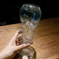 China Drinking Glass Clear Beer Glass Cup 16oz Qatar World Cup Trophy Shaped for sale
