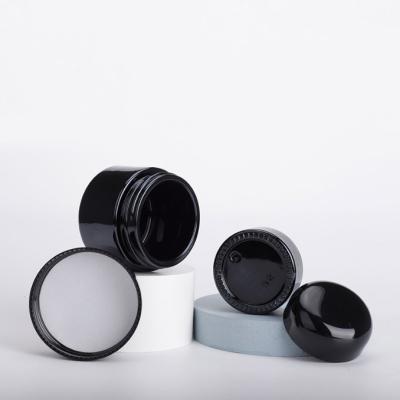 China 20g 30g 50g Black Eye Cream Jar With Lid Cosmetic Package Container Glass Cream Jar for sale