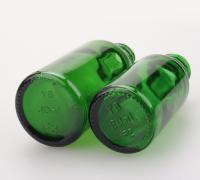 China Green Essential Oil Cosmetic Glass Bottle 5g 15g 20g 30g 100g With Tamper Proof Cap for sale