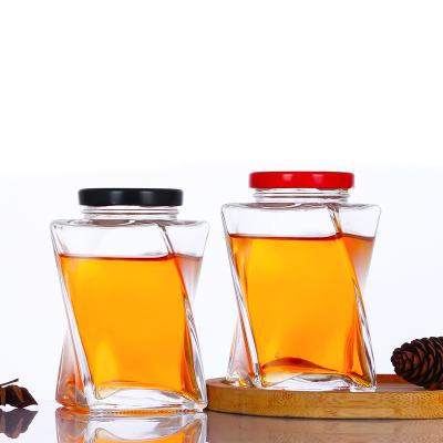 China 500g Empty Honey Bottles Clear Honey Glass Jar 12OZ Twist Shape With Lid for sale
