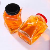 China 500g Empty Honey Bottles Clear Honey Glass Jar 12OZ Twist Shape With Lid for sale