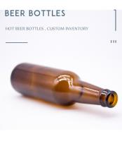 China Luxury Empty Clear Amber Or Brown Glass Storage Bottles 330ml For Beverage Beer for sale