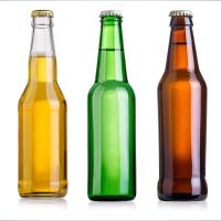 China Luxury Empty Clear Amber Or Brown Glass Storage Bottles 330ml For Beverage Beer for sale