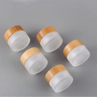 China 5 To 15ml Cosmetic Frosted Glass Jar With Wooden Cap for sale