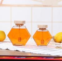 China Custom SGS Glass Storage Bottles Hexagon Honey Jars 0.5L To 1L Wooden Lid for sale