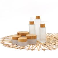 China Glass Cosmetic Containers Bamboo Cosmetic Packaging Bamboo Lid Cream Cosmetic Jar for sale