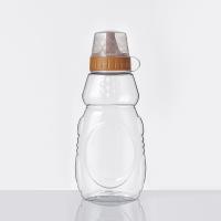 China BPA Free 800g Plastic Seasoning Bottles PET Refillable Honey Squeeze Bottle for sale