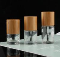 China High Quality Nail Polish Bottle Bamboo Cap Glass Cosmetic Containers for sale
