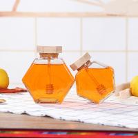 China Wooden Lid 12 Oz 13.4oz Hexagon Glass Honey Jar Transparent for sale
