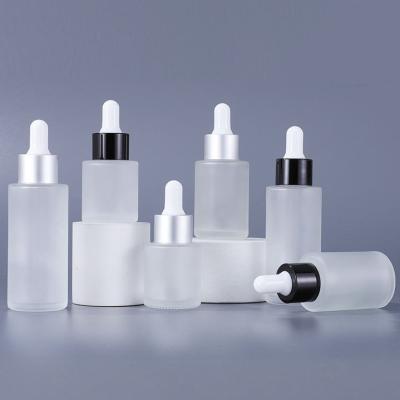 China Glass Cosmetic Containers Flat Shoulder Frosted Cosmetic Serum Dropper Bottle for sale