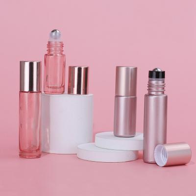 China 10ml Glass Cosmetic Containers Ampty Pink Essential Oil Glass Roller Bottle for sale