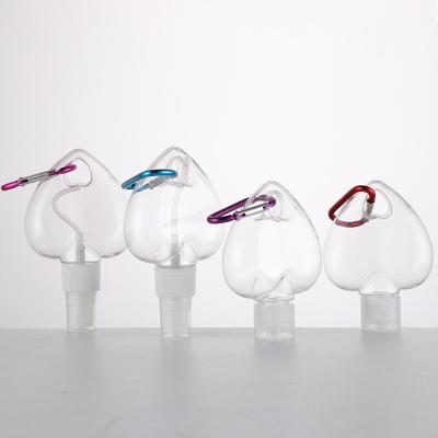 China 60ml 50ml Alcohol Keychain Spray Bottles Empty Heart Hook PET for sale