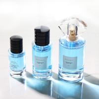 China Magnet Cap Scent Glass Cosmetic Containers Perfume Glass Bottle 50ml Crimp Seal for sale