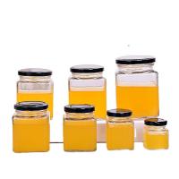 China Square Glass Storage Bottles 750ml 26.5oz Spice Jars With Black Lids for sale