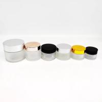 China Cream Clear Frosted Glass Cosmetic Containers Jar 30g To 100g With Silver Lid for sale