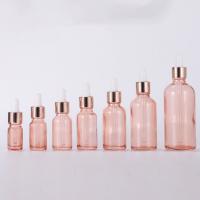 China Round Glass Cosmetic Containers Pink Dropper Bottle 10ml To 100ml for sale