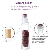 China 10ml Glass Roll On With Gemstone Essential Oil Roller Bottle With Bamboo Cap for sale