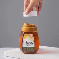 China 300g 500g 1000g Honey Bottles Reflux Inlet Sealing Plastic Seasoning Bottles for sale