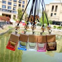 China Diffuser Crystal Glass Bottles Colorful Green Pink Yellow With Wood Cap for sale