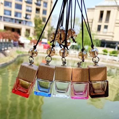 China Diffuser Crystal Glass Bottles Colorful Green Pink Yellow With Wood Cap for sale