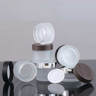 China Clear Frosted Skincare Transparent Glass Jars Cosmetic 30ml 50ml 50g for sale